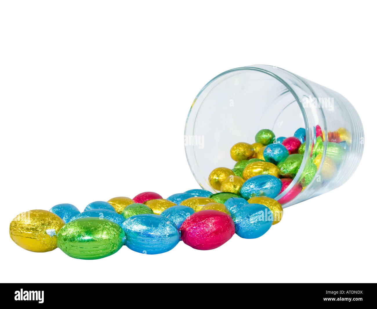Chocolate eggs spilling out of a jar. Traditional Easter sweet Stock ...
