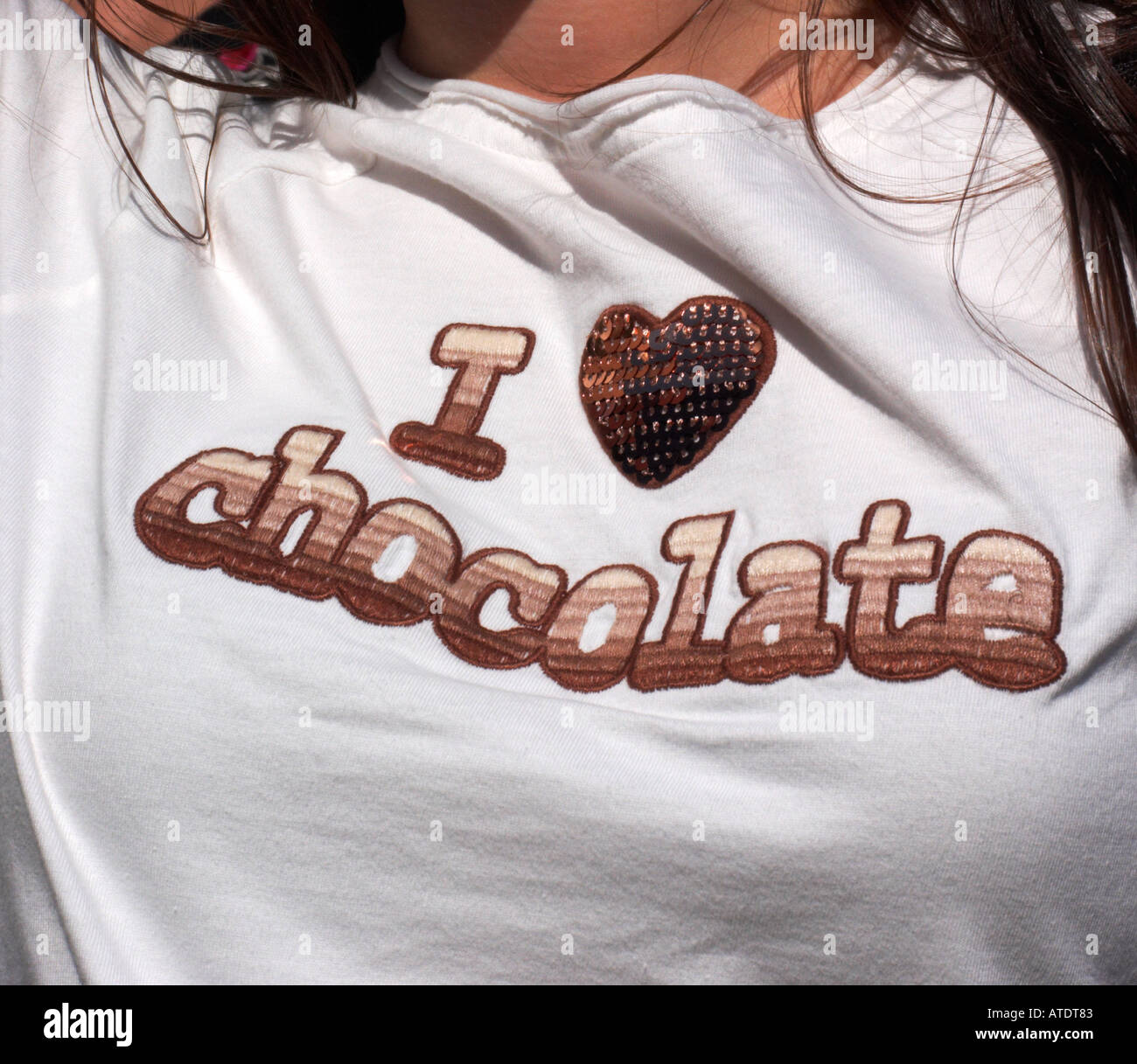 teenage girl with I love chocolate tee shirt Stock Photo - Alamy