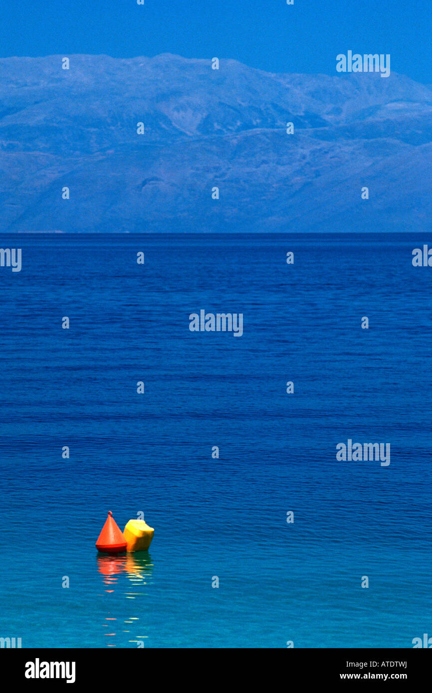 A buoy floats in a deep blue ocean off of Greece Stock Photo - Alamy