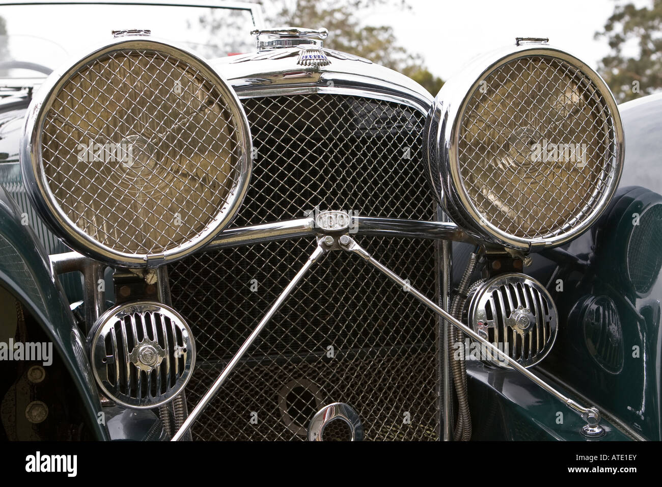 SS100 sports car headlights and grill Stock Photo - Alamy