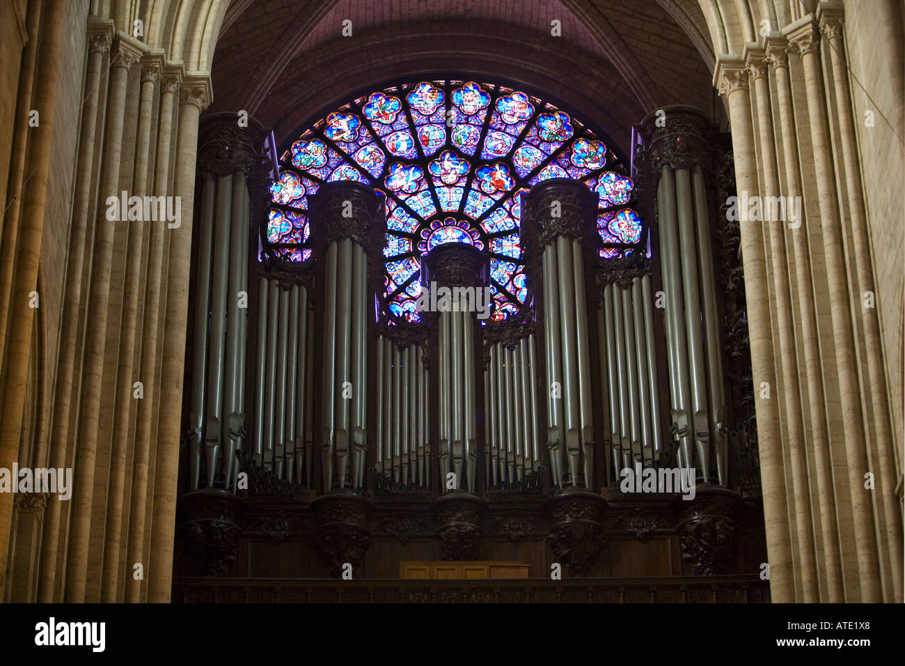 Pipe organ and stained glass window in Notre Dame, Paris, France Stock ...