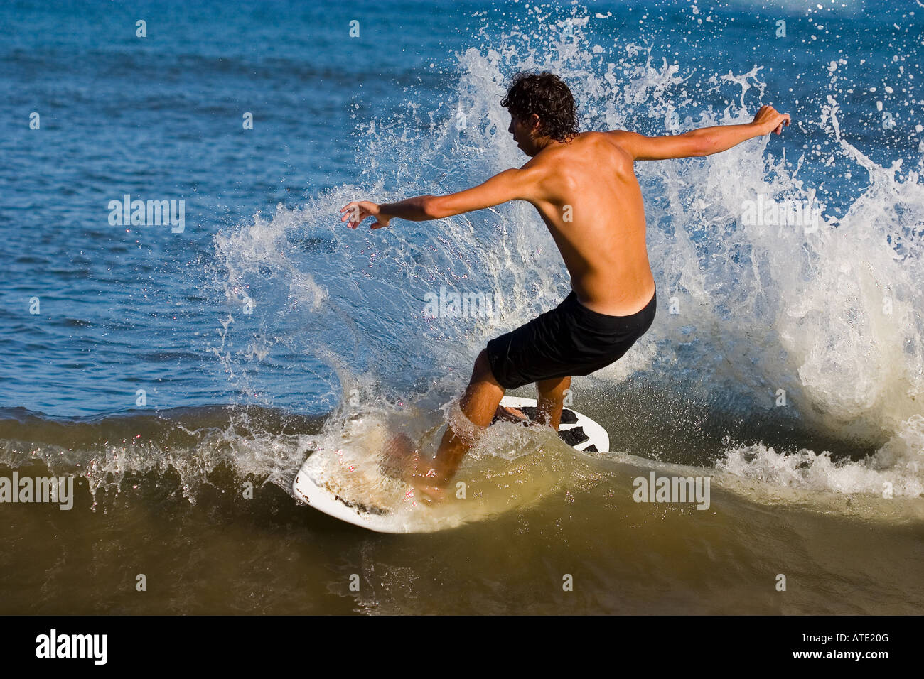 skimboarder in santa barbara california Stock Photo - Alamy