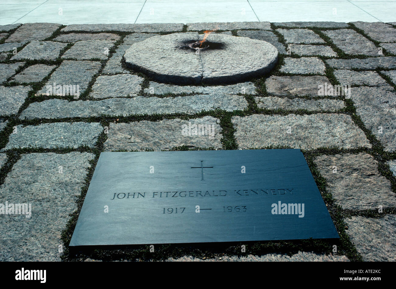 LANDSCAPE OF JOHN F KENNEDY GRAVE WITH HEADSTONE AND ETERNAL FLAME ...
