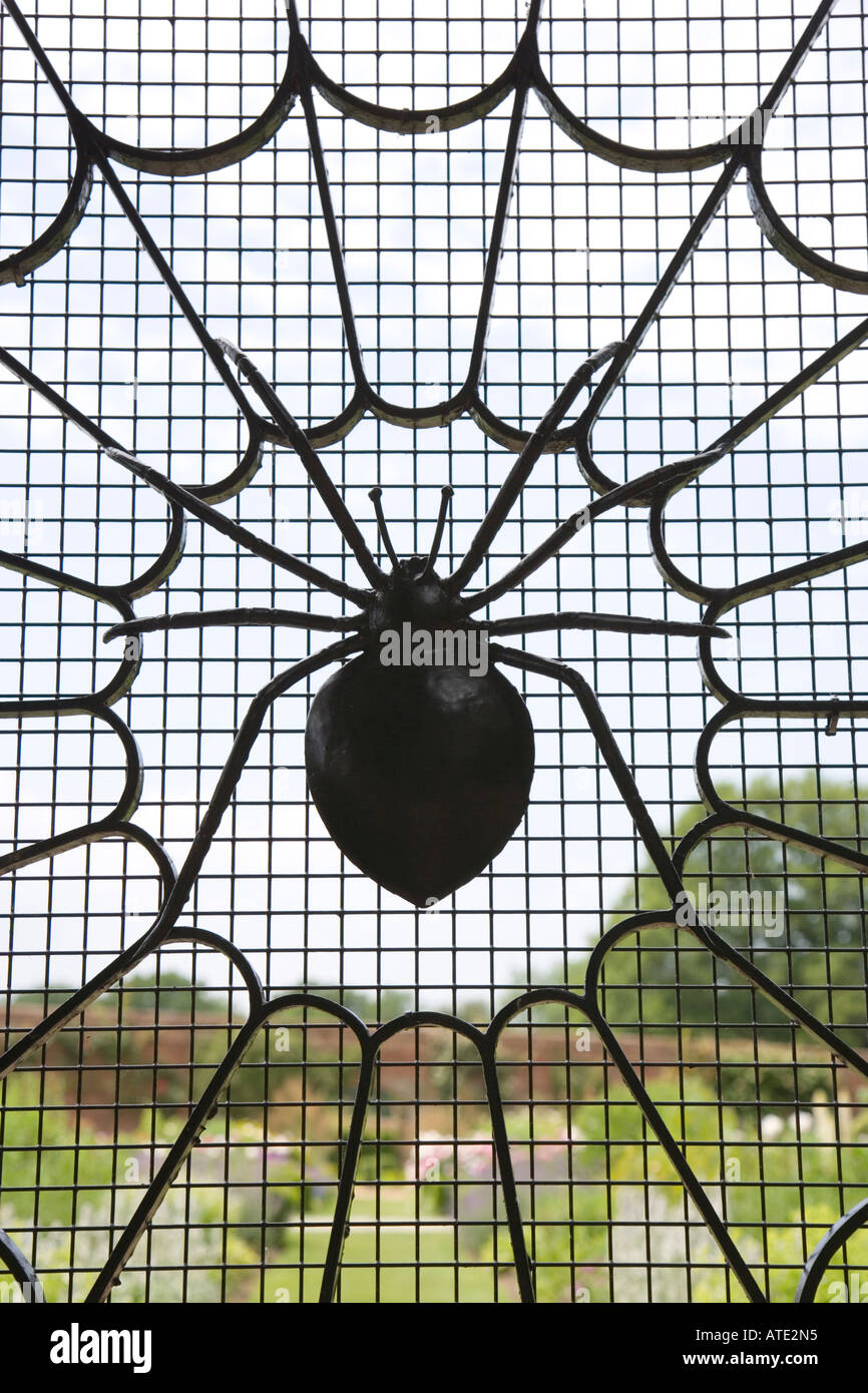 Wrought Iron Gate with Spider Web Design Stock Photo - Alamy