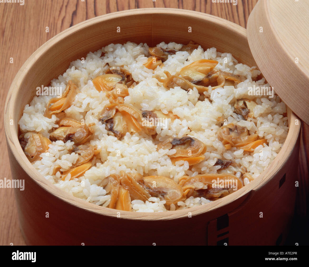 Steamed rice with clams Stock Photo - Alamy