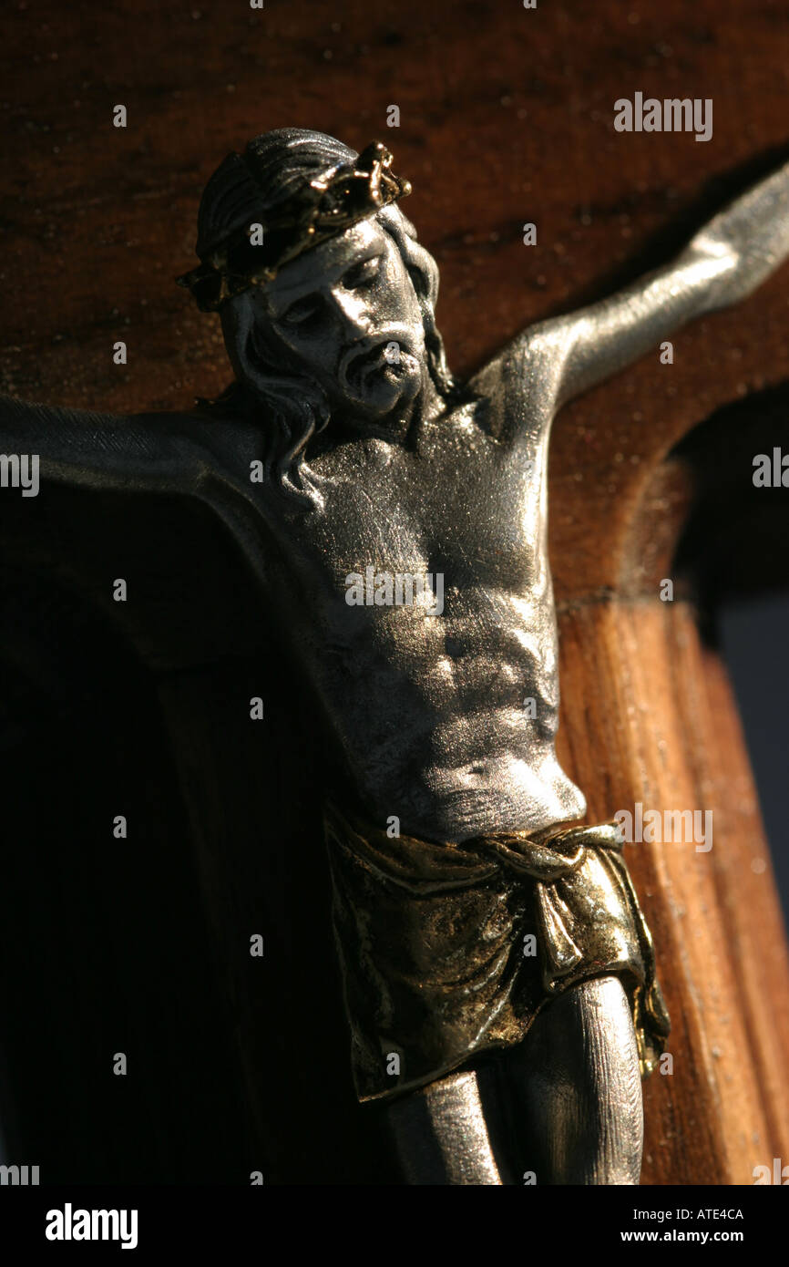 Figure of christ on a crucifix Stock Photo - Alamy