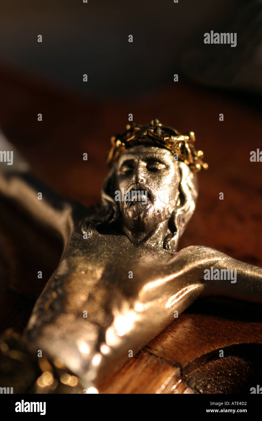 Figure of christ on a crucifix Stock Photo - Alamy