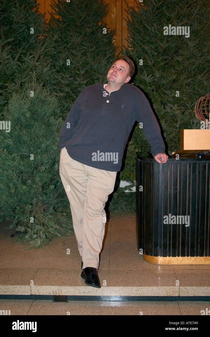 Man waiting patiently at pulpit for his brothers wedding practice to ...