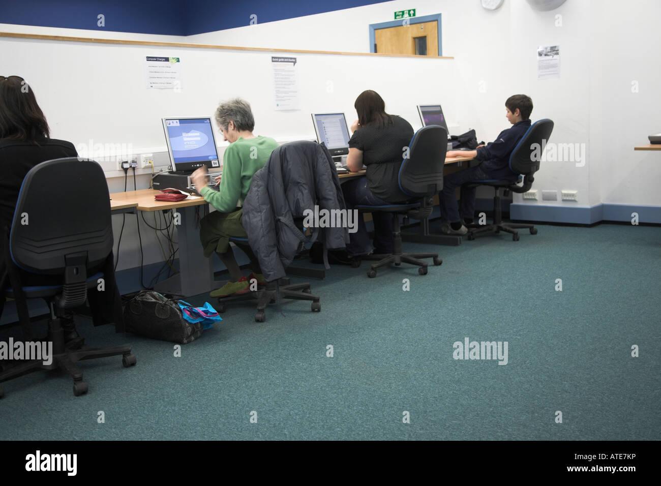 People on internet computers in public library Stock Photo - Alamy