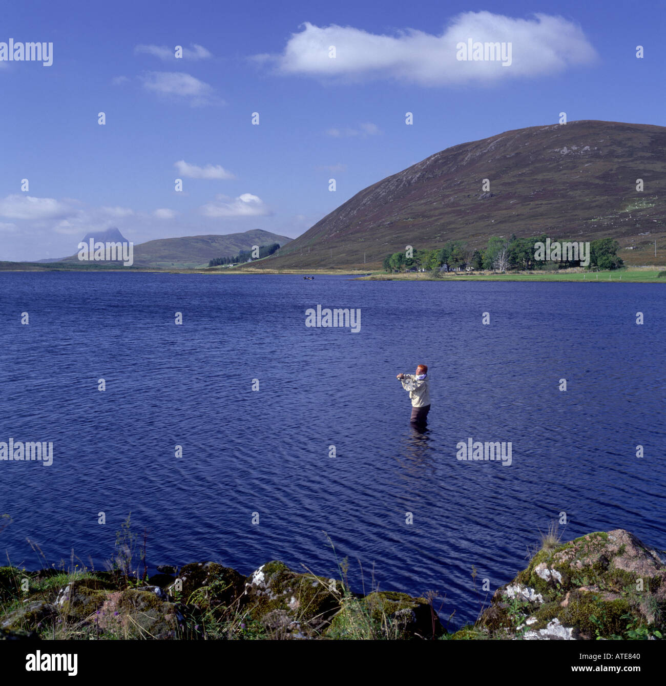 Lone Angler Trout Fishing in Sutherland Scotland GFIM 1020-14 Stock ...