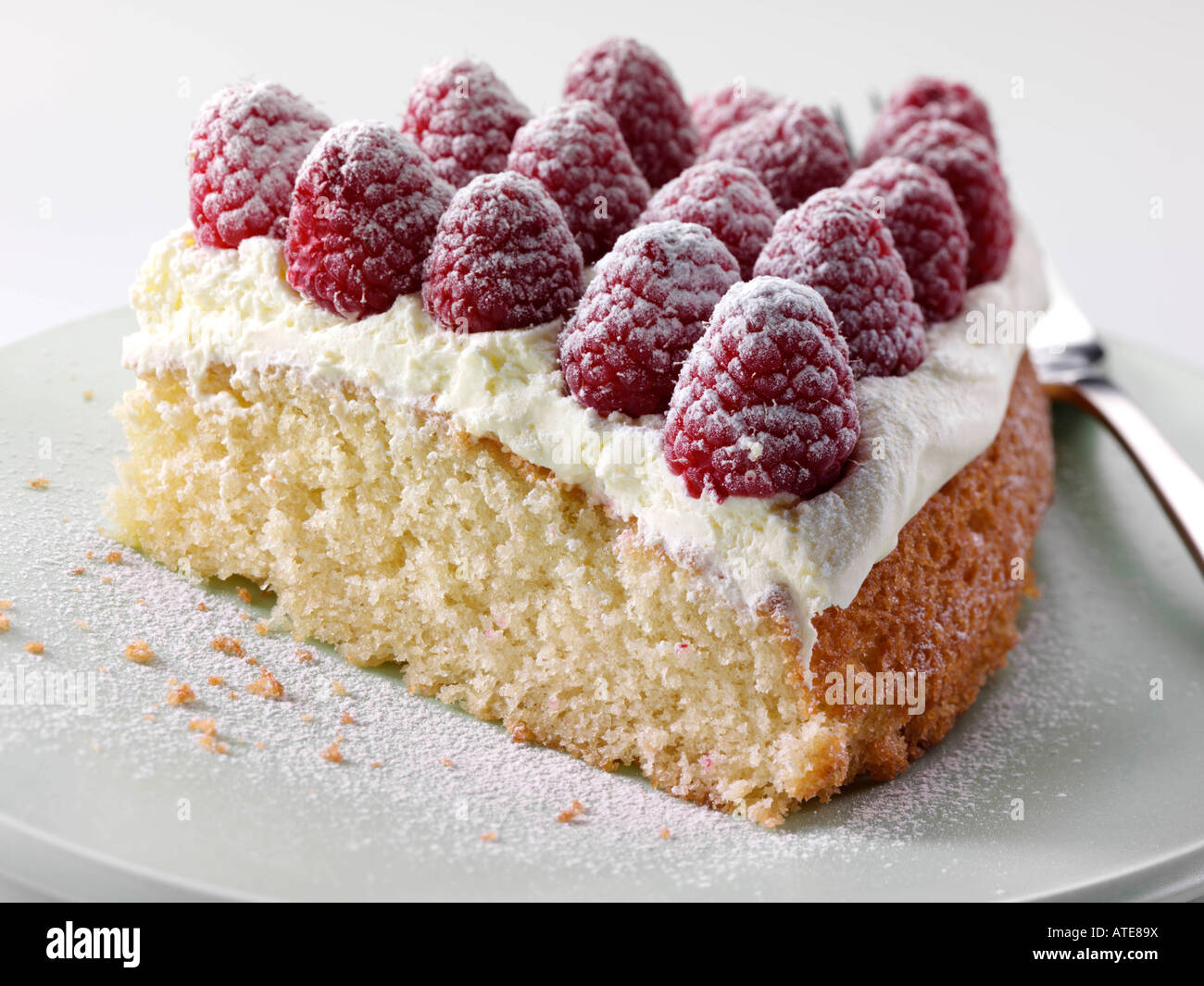Raspberry slice fruit sponge cake editorial food Stock Photo - Alamy