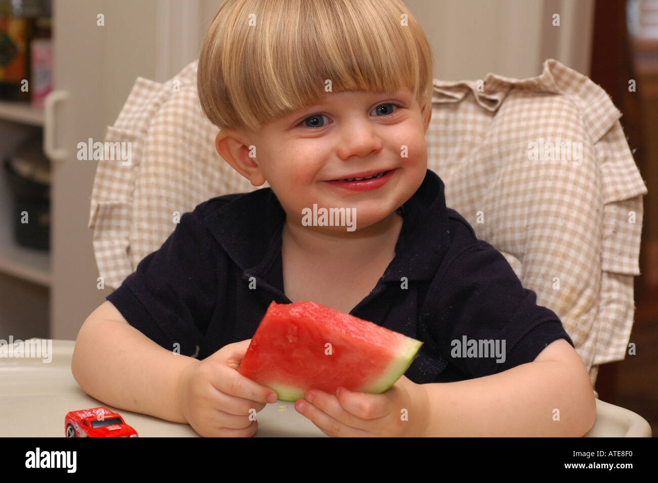Toddler boy eating watermelon fruit hi-res stock photography and images ...