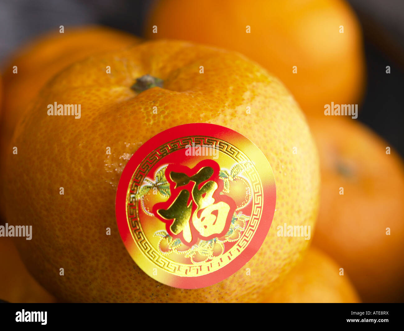close up of mandarin oranges with lucky sticker Stock Photo - Alamy