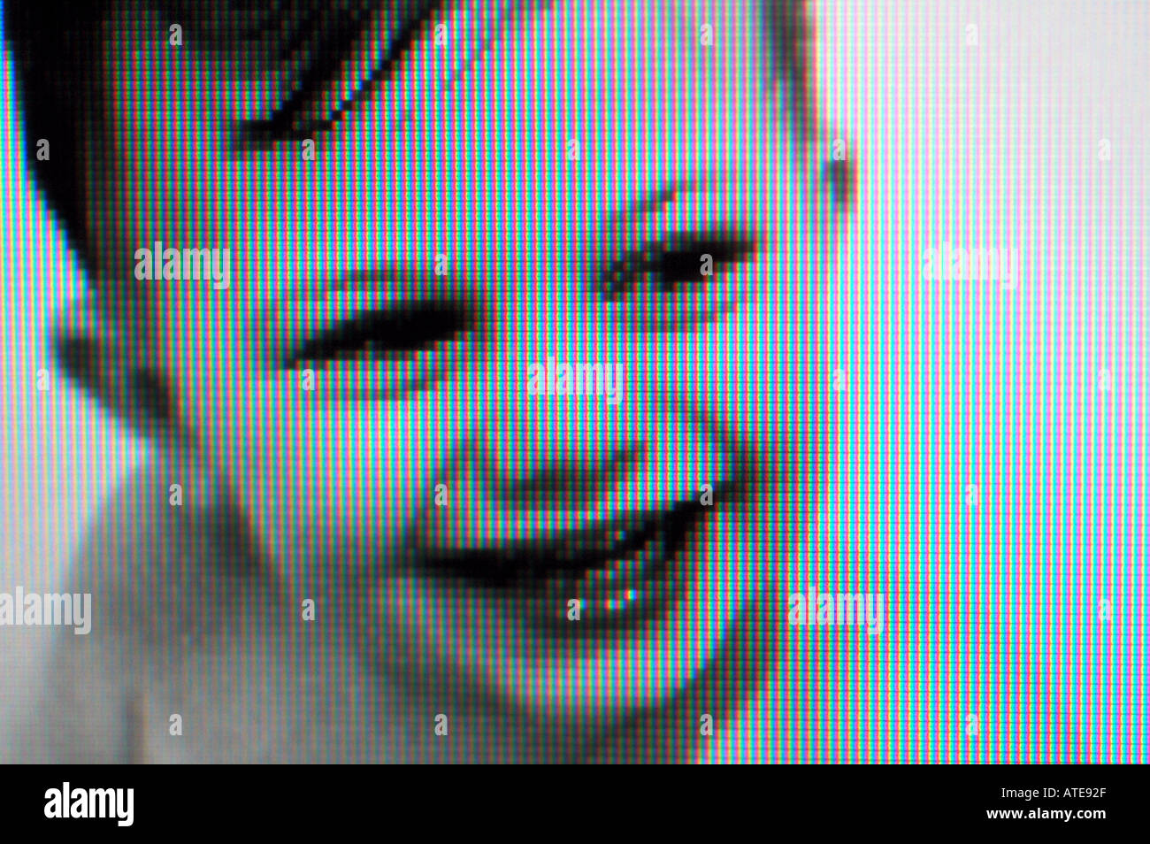 surreal image of boy smiling shown on home video screen Stock Photo - Alamy