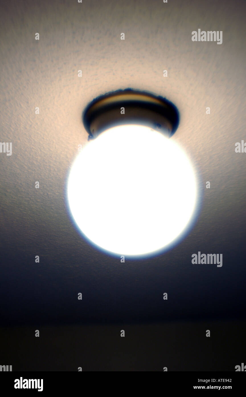 Light fixture and bulb on ceiling Stock Photo - Alamy