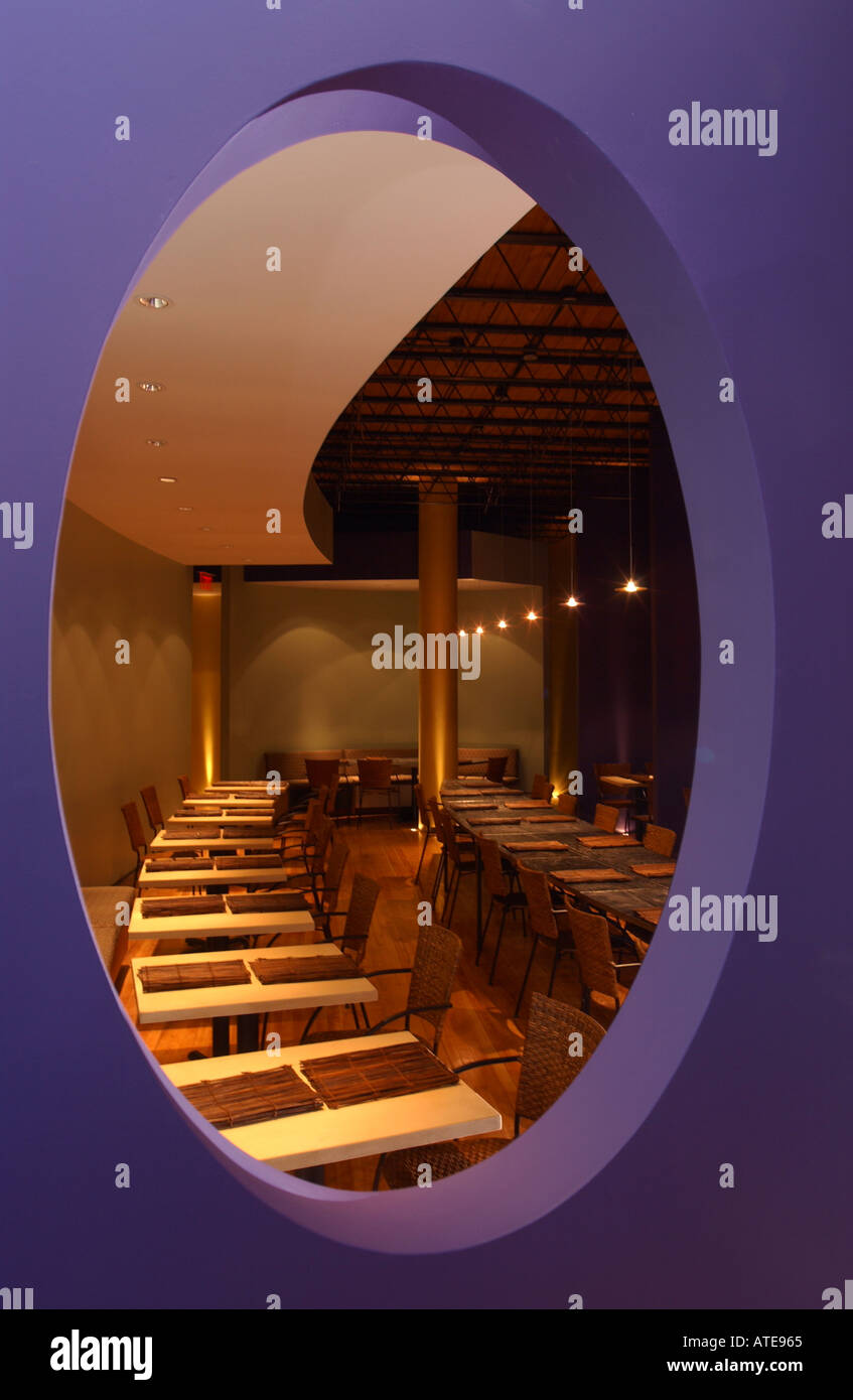 restaurant shown through circular window Stock Photo - Alamy