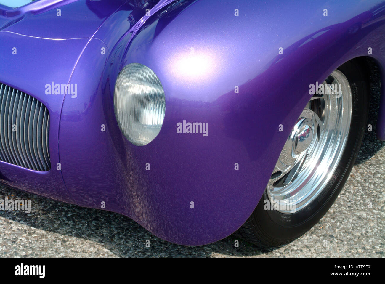 the fender and headlight of an antique purple hot rod Stock Photo - Alamy