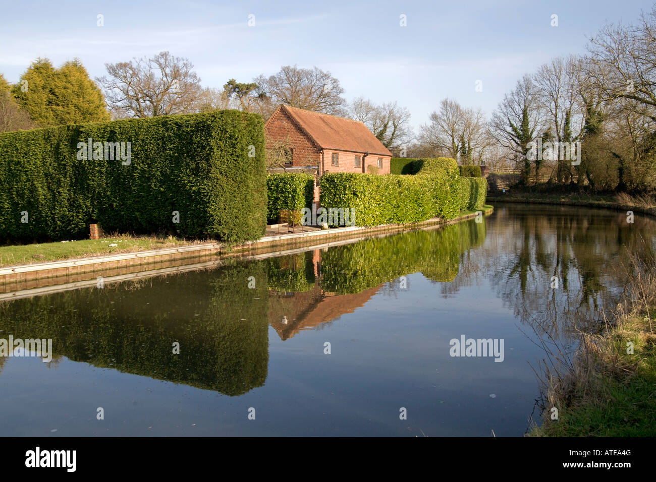 Houses next to canal or river Stock Photo - Alamy