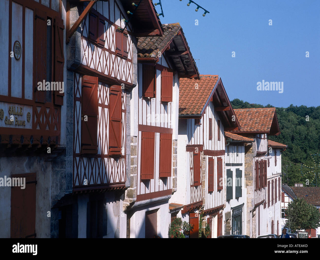 Typical of the Basque country red and white timbered buildings fringing ...