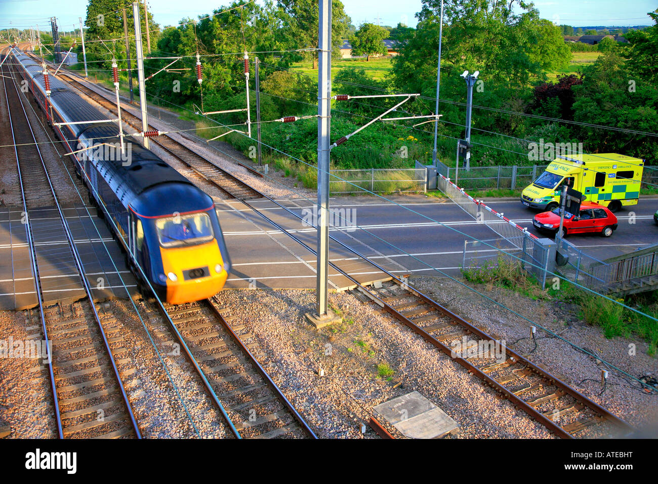 GNER 43 Class passes Ambulance on an emergency call held up at a ...