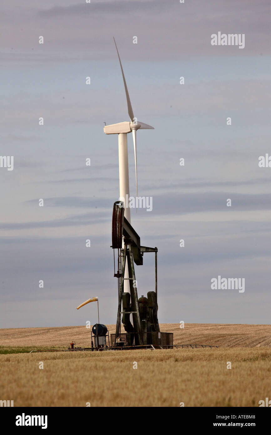 Oil pump near windmill electricity hi-res stock photography and images ...
