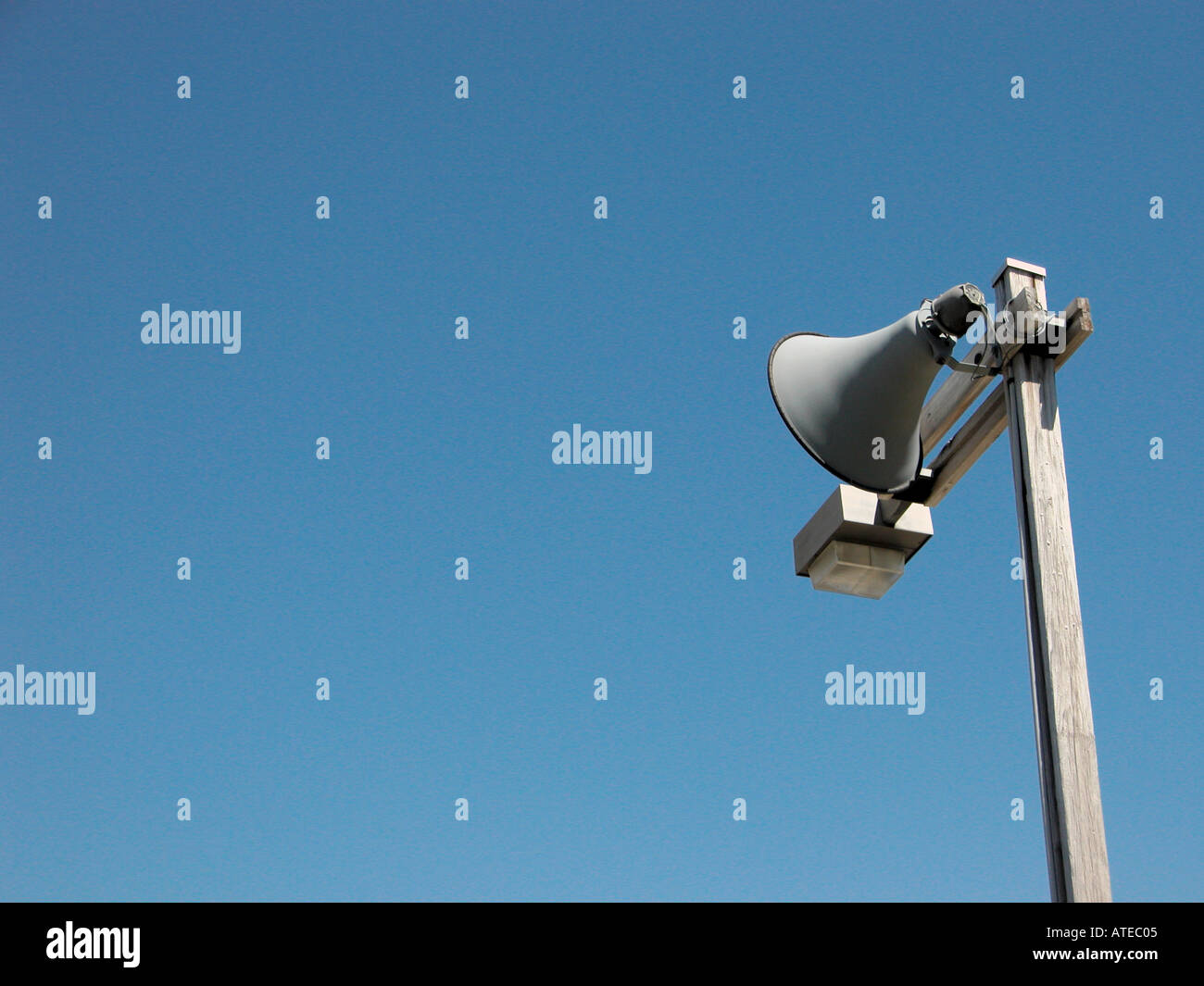 loud speakers on post and sky Stock Photo - Alamy