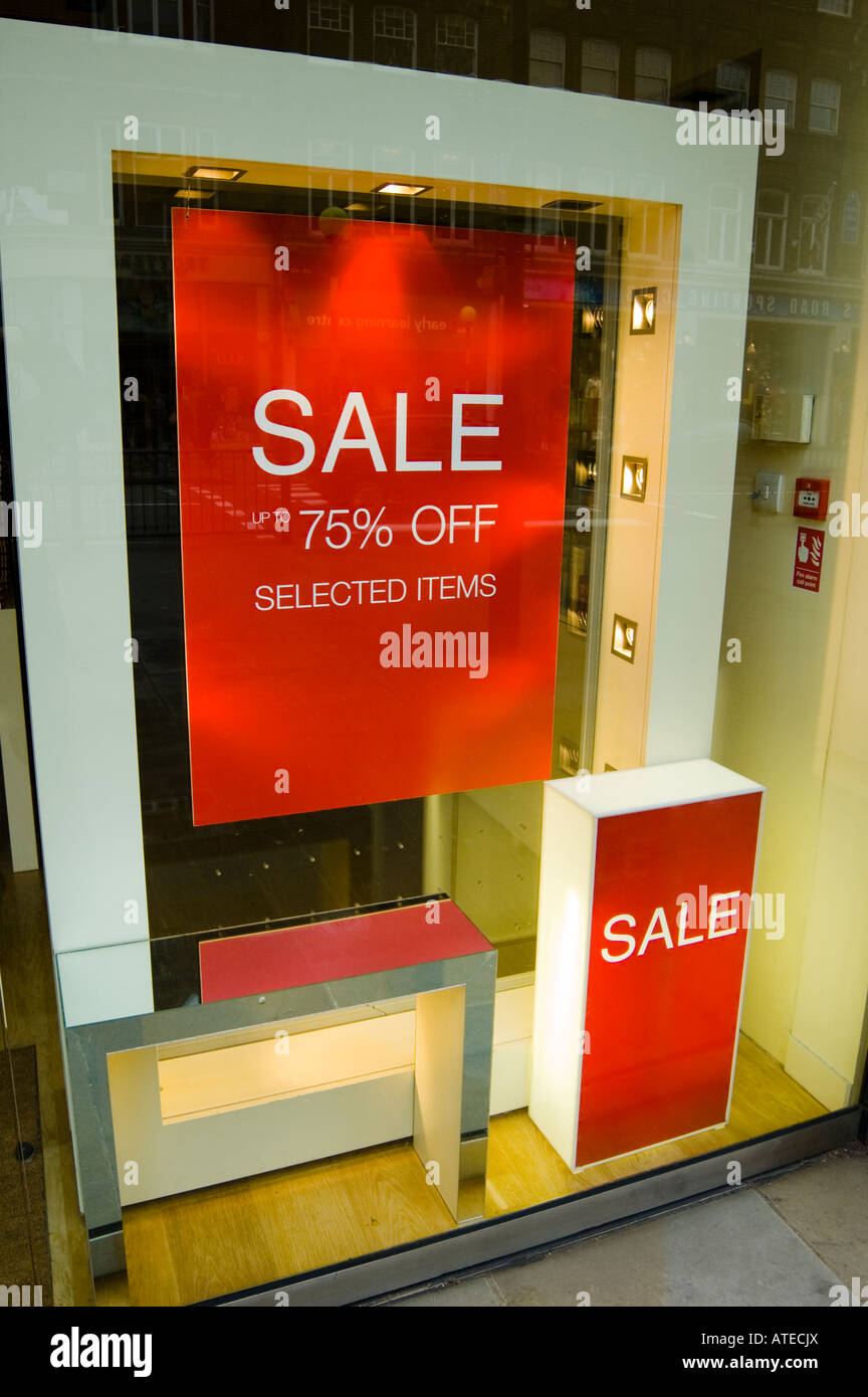 a shop window showing sale sign Stock Photo - Alamy