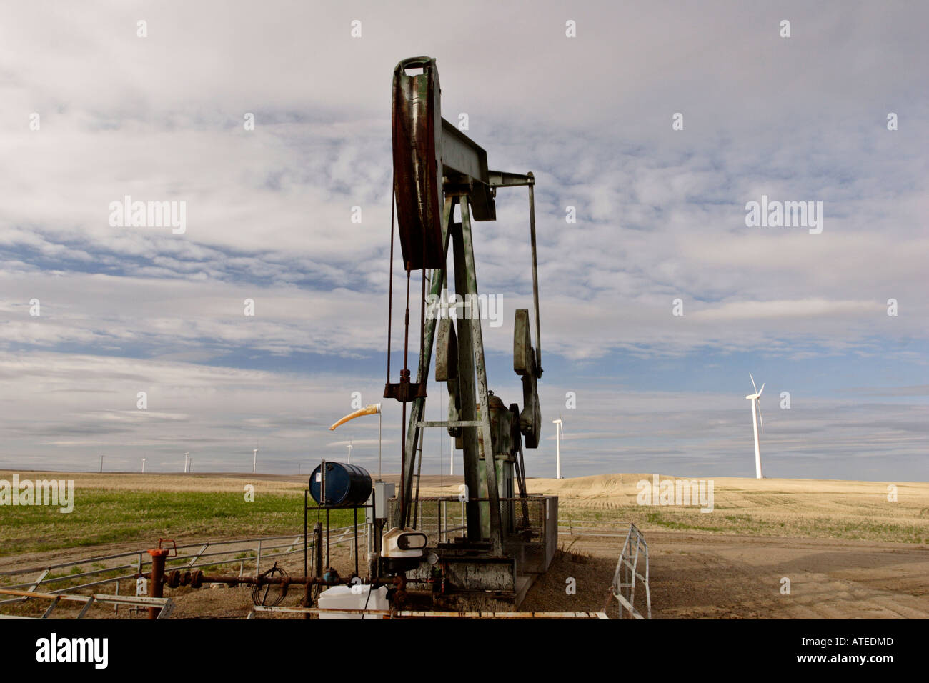 Oil pump with windmill electrical generators in Saskatchewan Stock ...