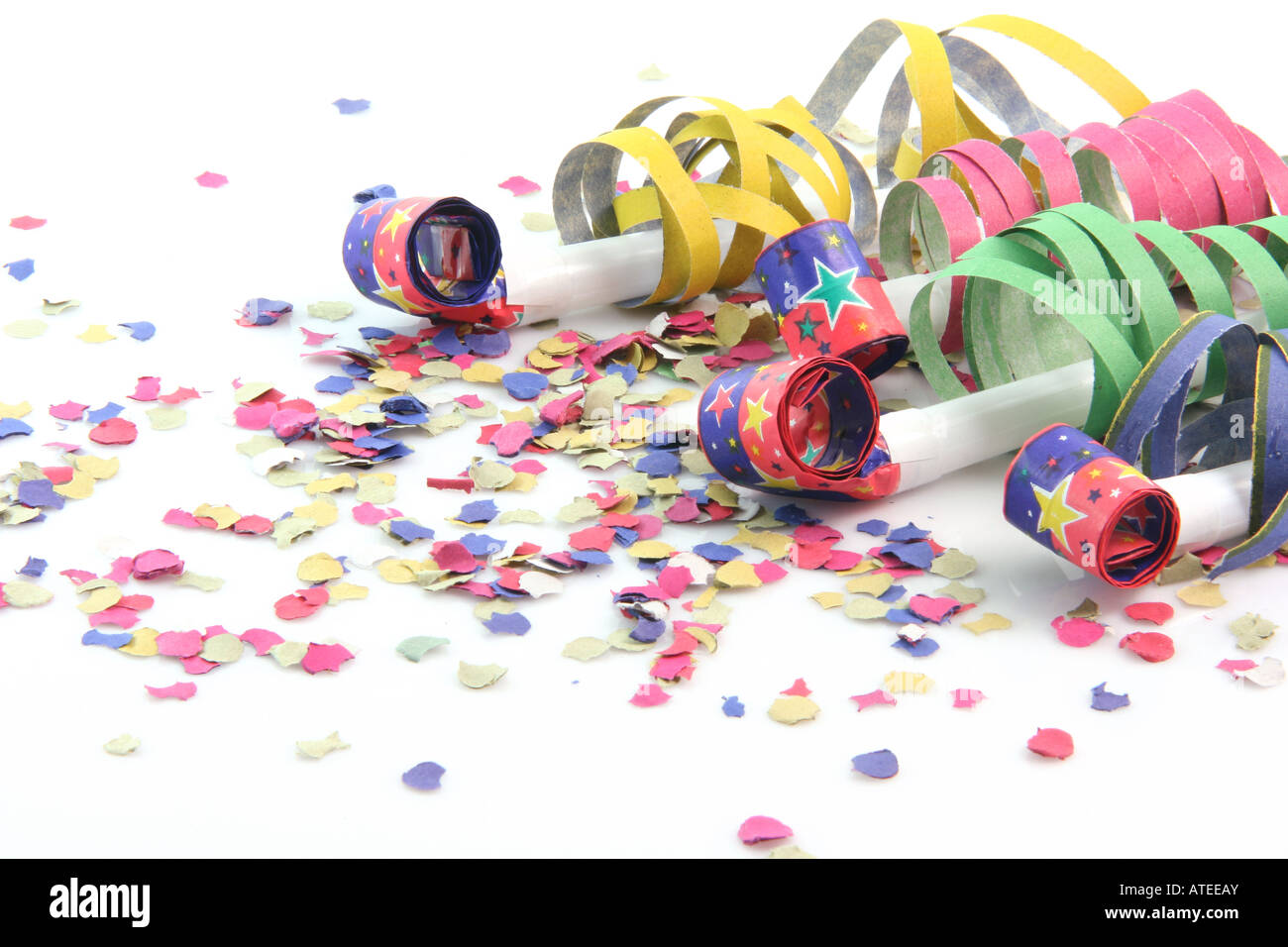 party concepts paper confetti with streamers and four party blowers on ...