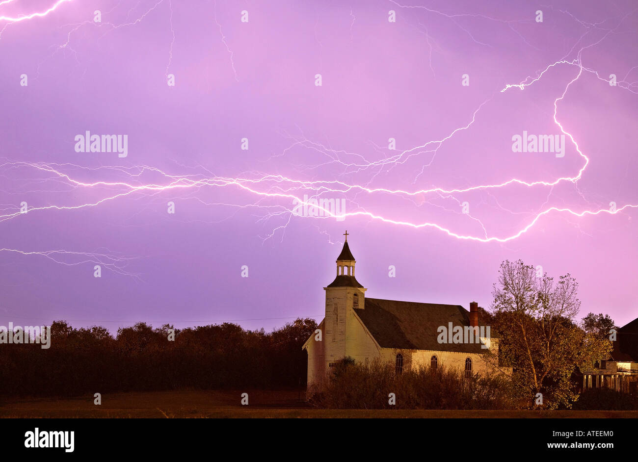 Bolt lightning lighting up the church at Spring Valley Stock Photo - Alamy