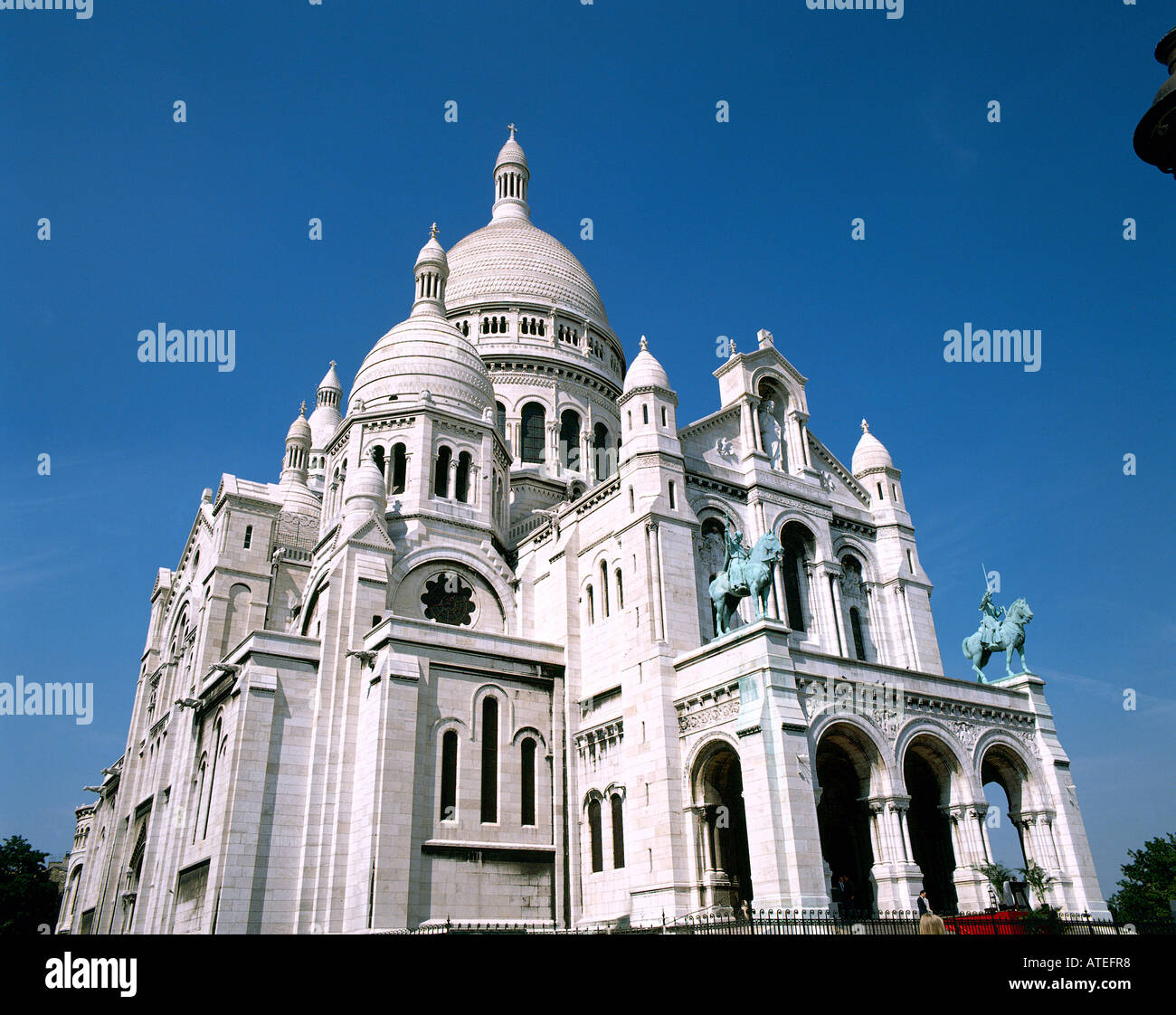 The white basilica of the Sacre Coeur completed in 1914 and consecrated ...