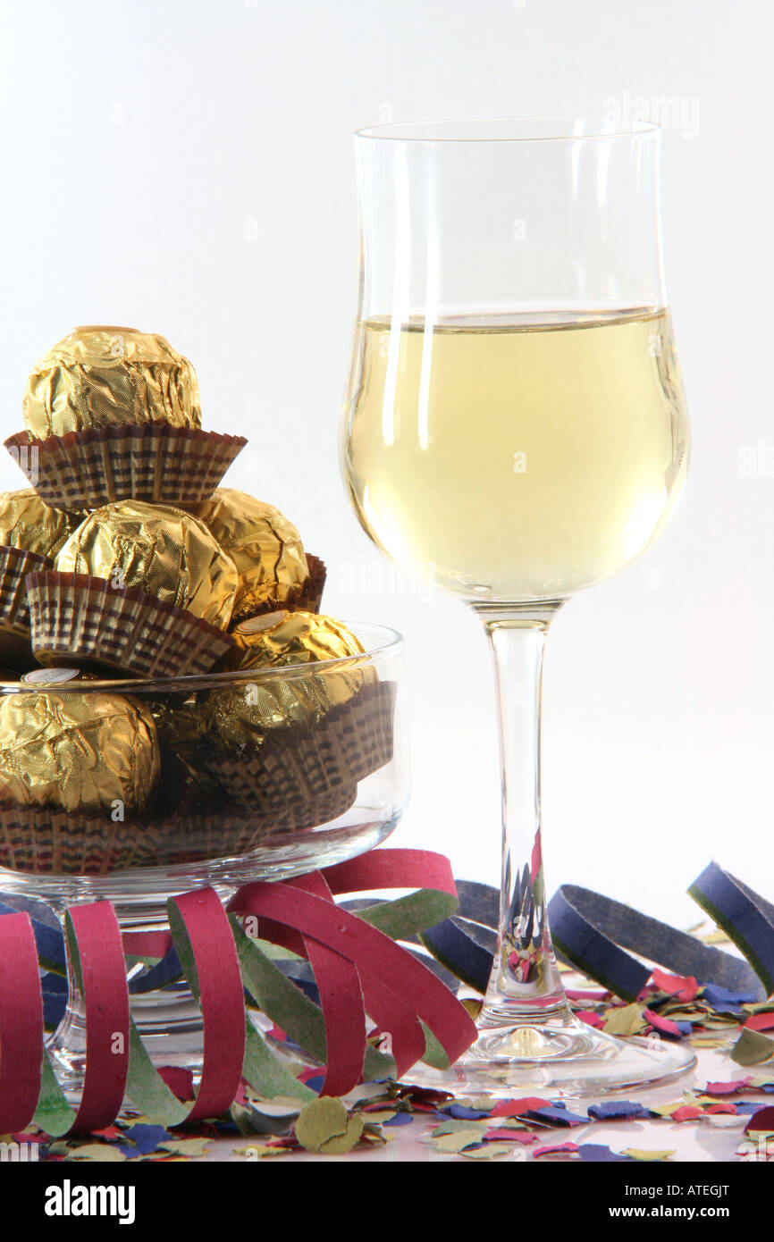 celebration and party time paper confetti streamers wine glass and ...