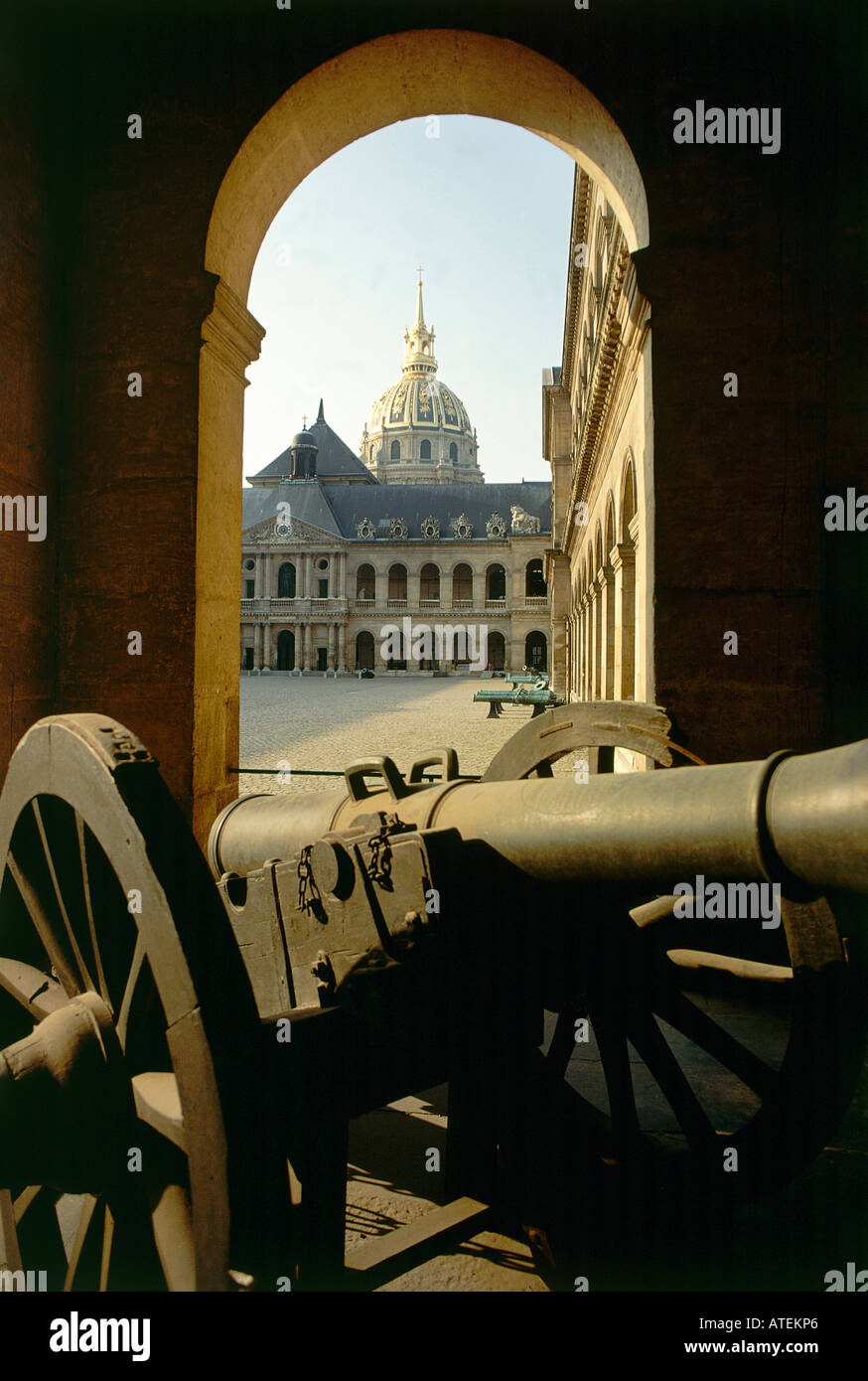 A cannon in the grounds of Les Invalides designed in 1676 with the dome ...
