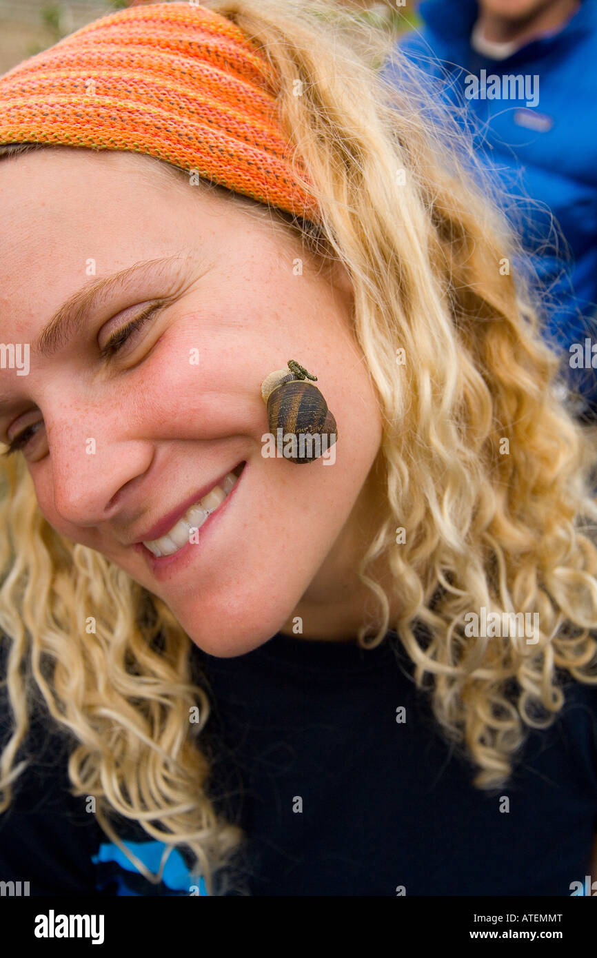 girl with snail on her face Stock Photo - Alamy