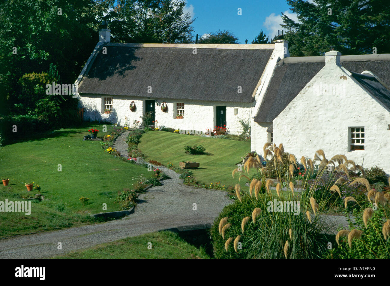 An18th century whitewashed cottage in the village of Swanston Stock ...
