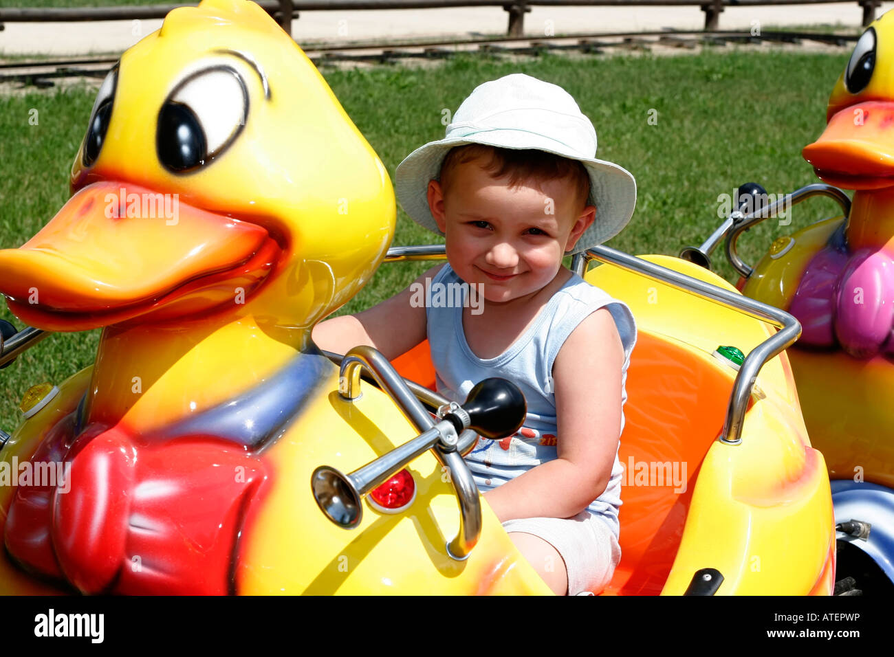 Child boy duck ride hi-res stock photography and images - Alamy