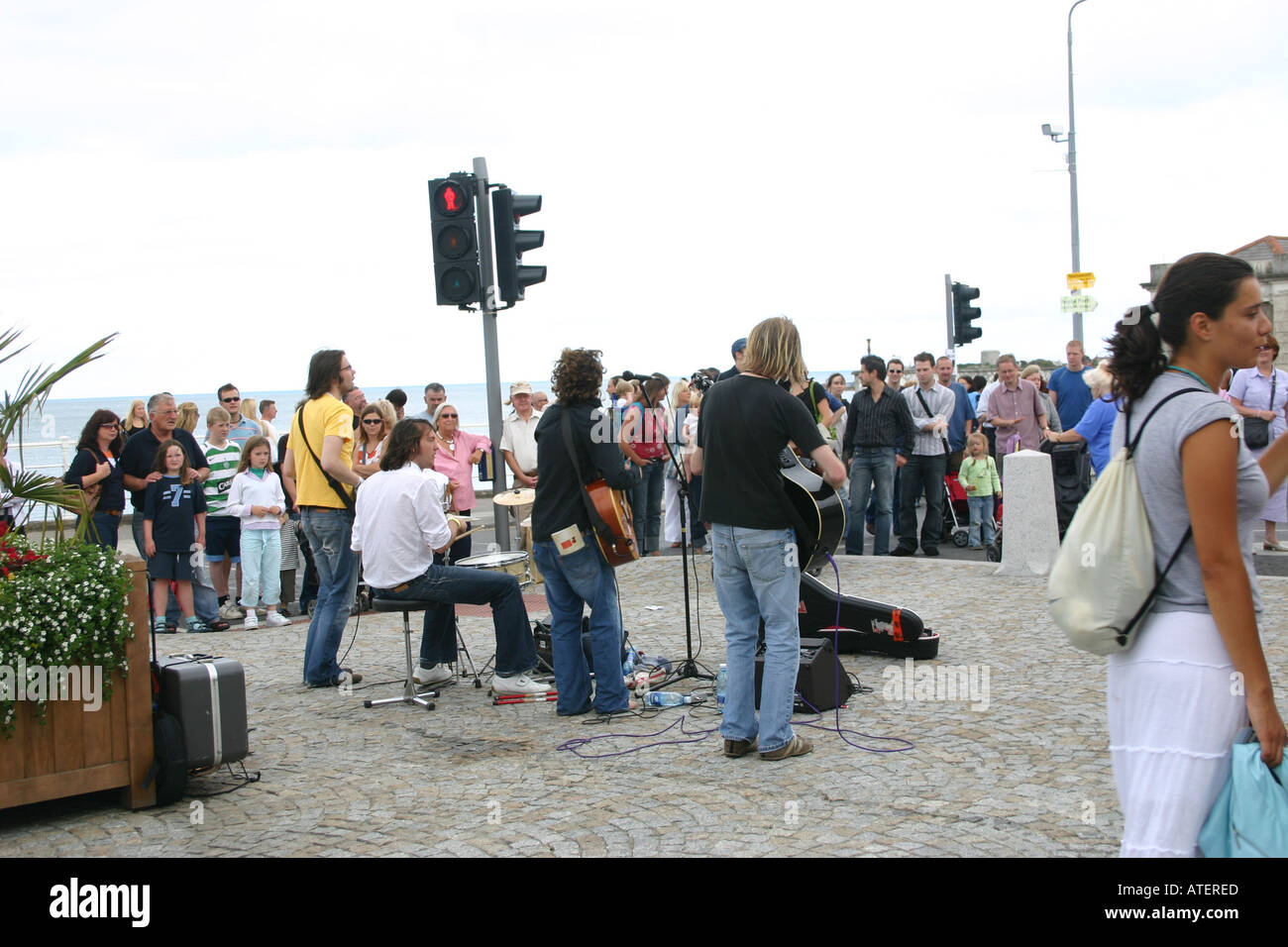 Busking at traffic lights hi-res stock photography and images - Alamy