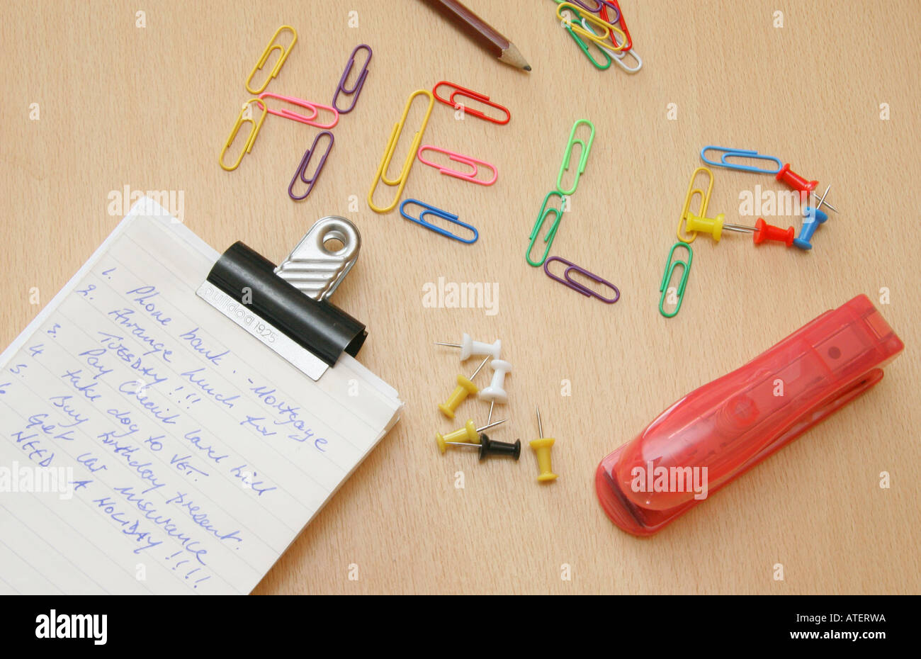 Help paper clips paper Stock Photo - Alamy