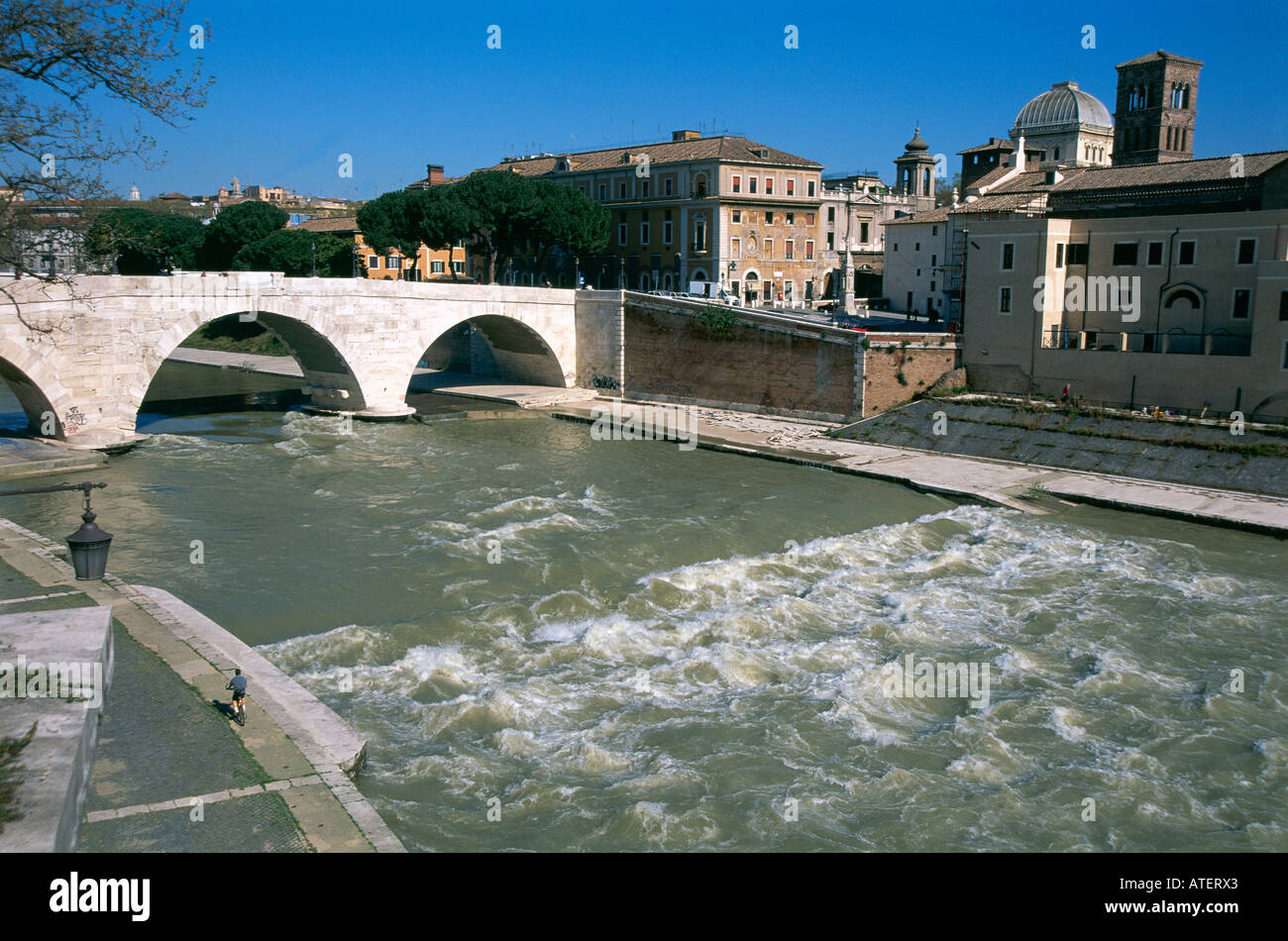 A bridge crossing the river to the Isola Tiberina Tiber Island the ...