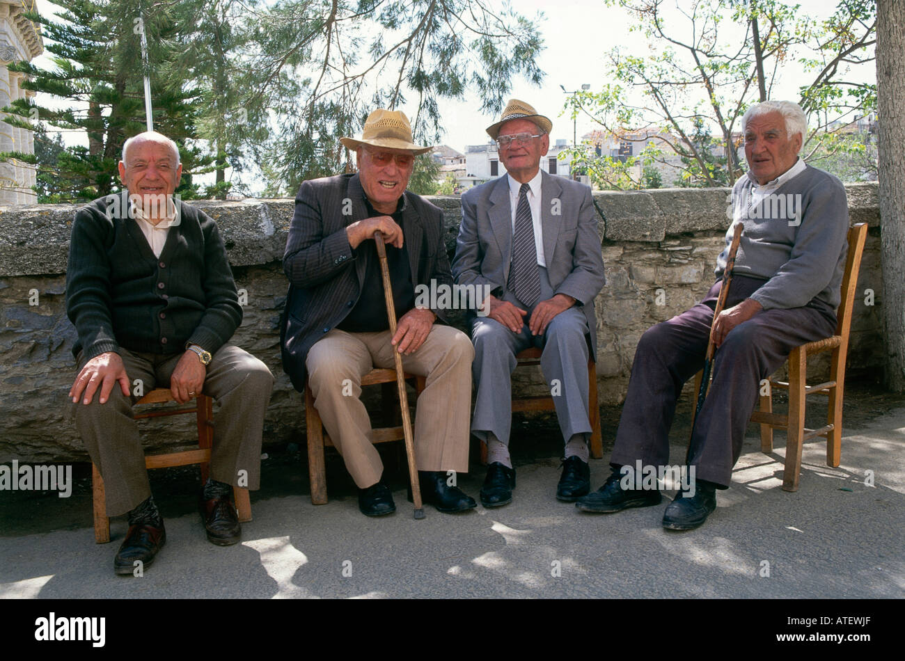 Cypriot men sitting outside a village cafe in Lefkara Stock Photo - Alamy