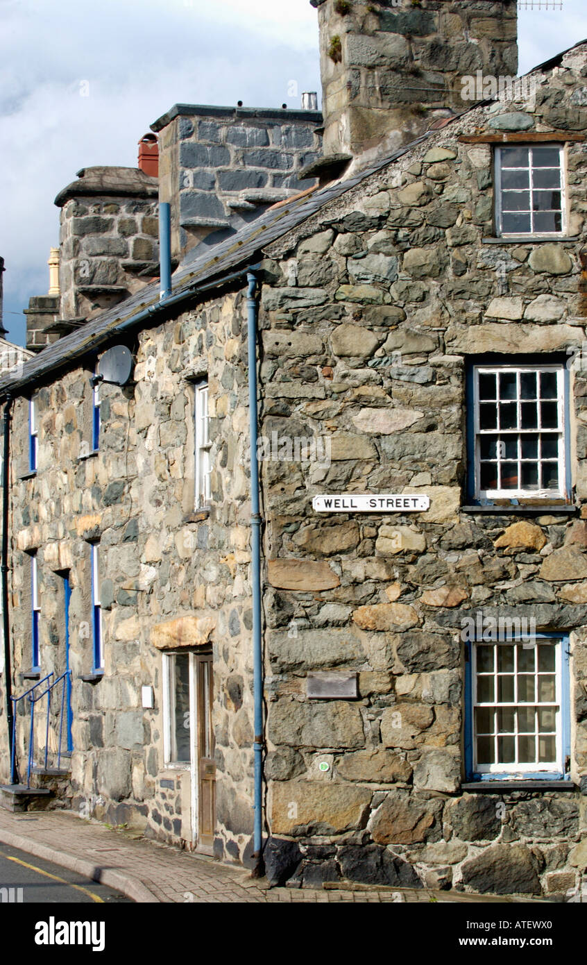 Traditional terraced cottages built with large irregular shaped stones ...