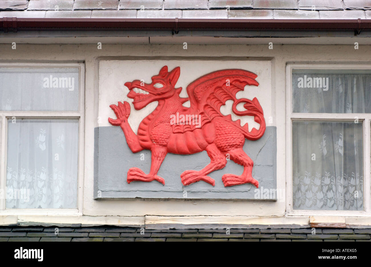 Red Dragon plaque on house in the town of Dolgellau Gwynedd North Wales ...