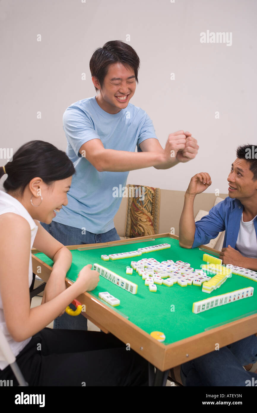 Men playing mahjong hi-res stock photography and images - Alamy