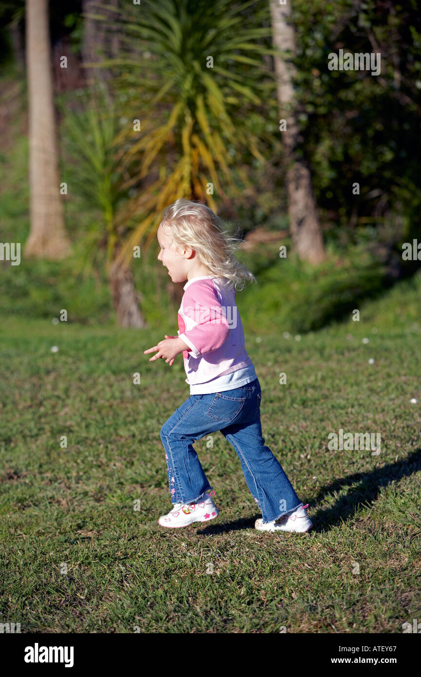 Young girls playing laughing and running outdoors model released 482 ...