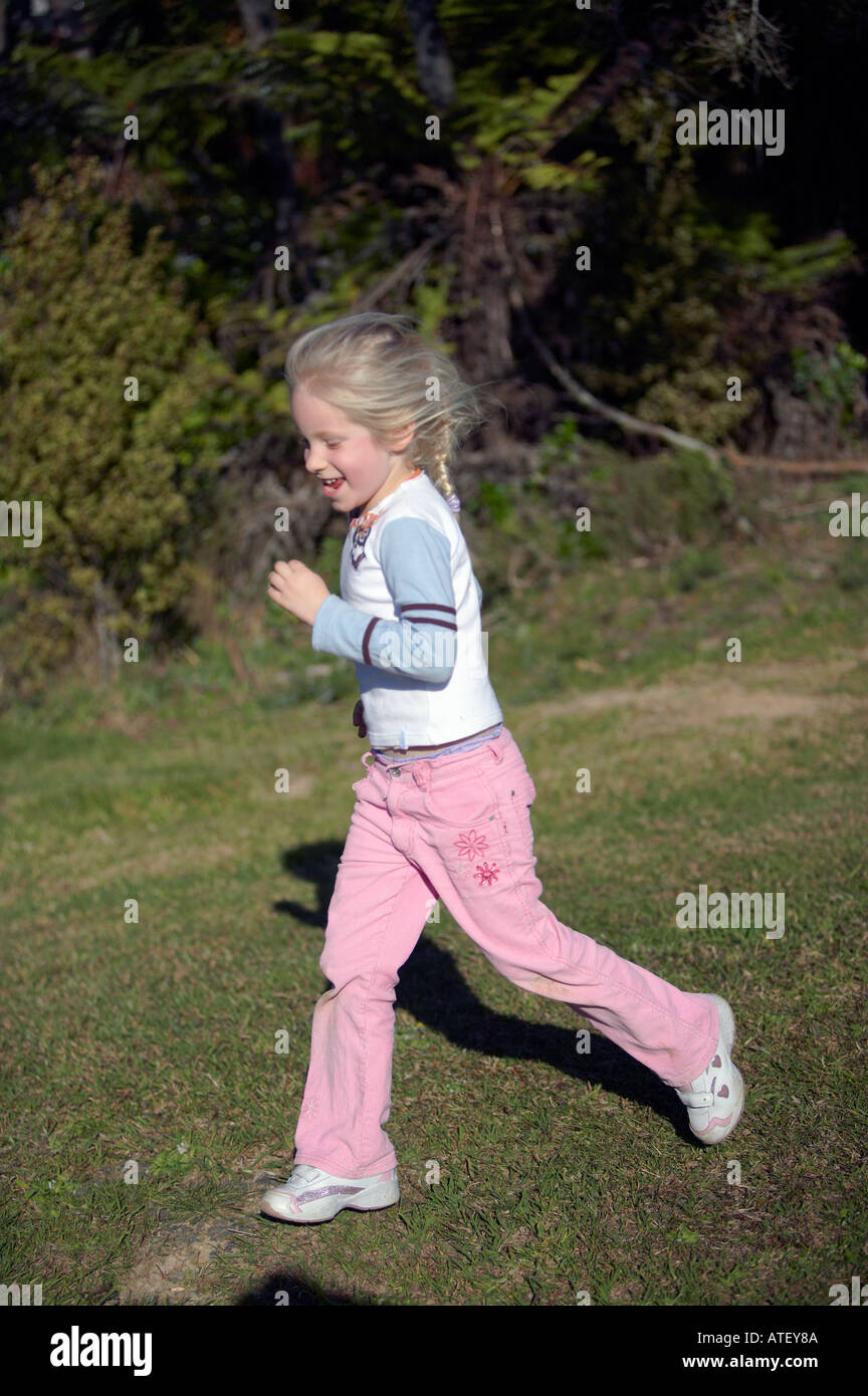 Young girls playing laughing and running outdoors model released 482 ...