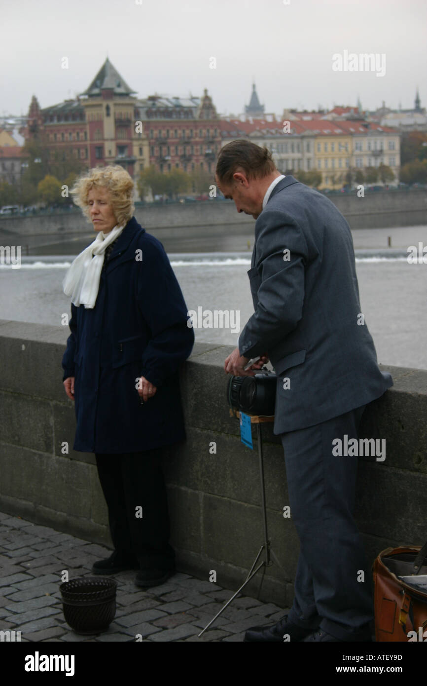 Opera singer busker on The Karluv, Charles medieval Bridge, Prague ...