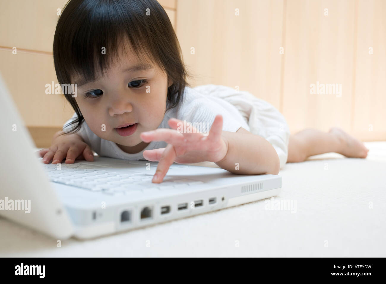 Barefoot girl on laptop hi-res stock photography and images - Alamy