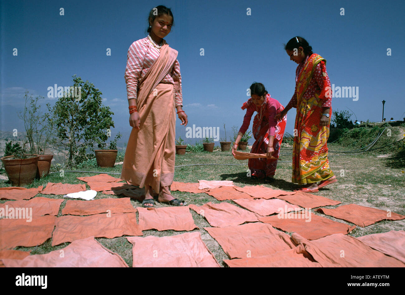 Women drying clothes hi-res stock photography and images - Alamy