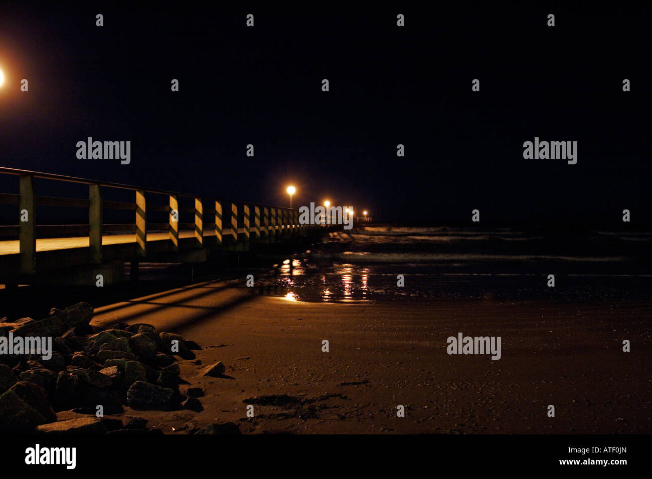 Beach in night light Stock Photo - Alamy