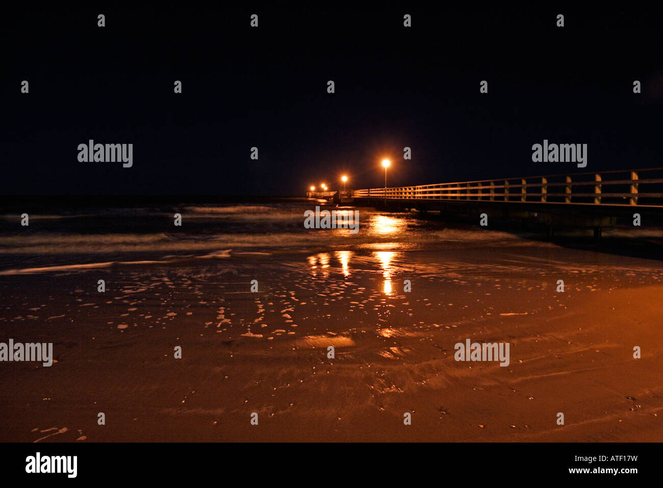 Beach in night light Stock Photo - Alamy